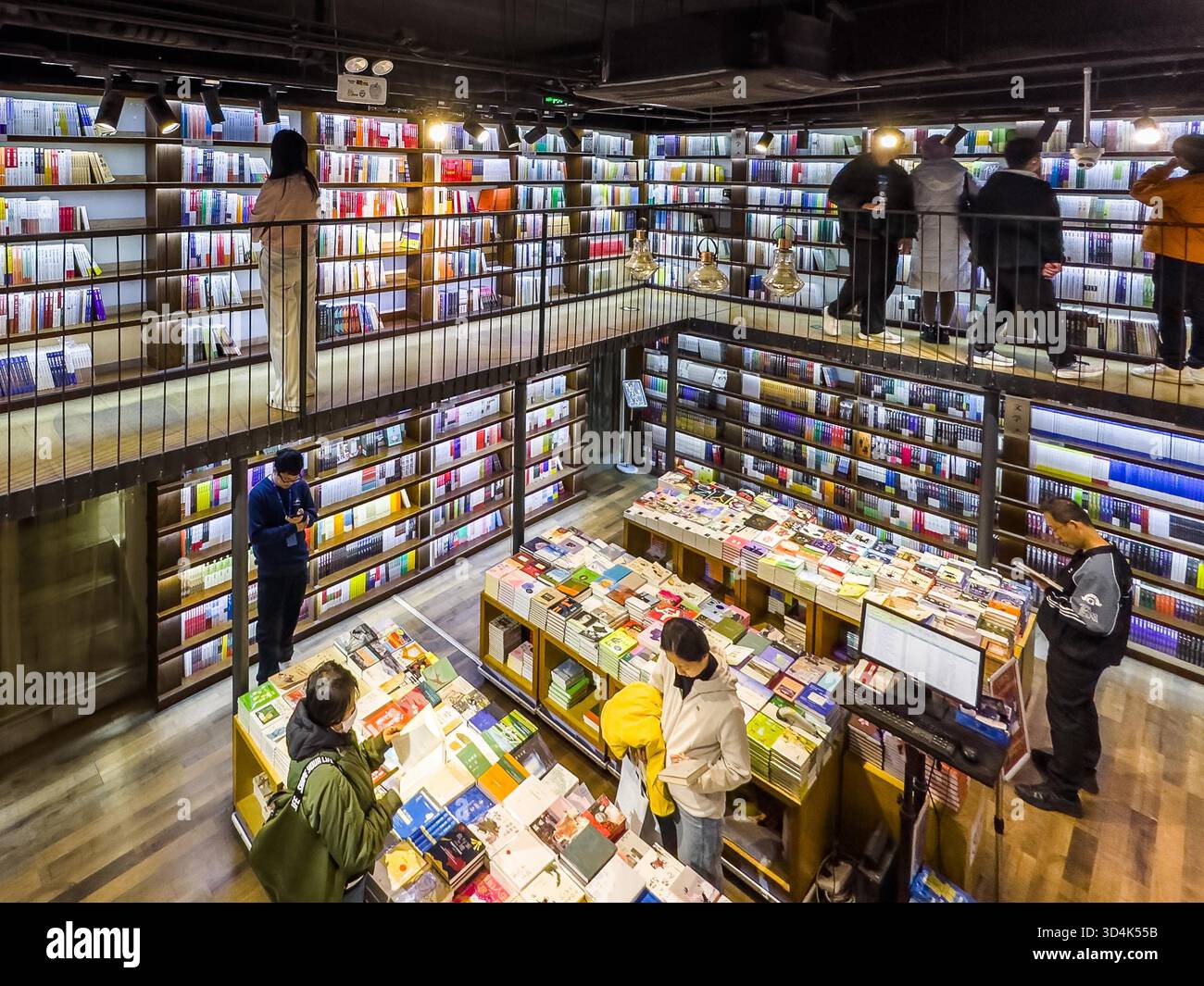 People read books at a bookstore in Beijing, China, 8 November, 2025 ...