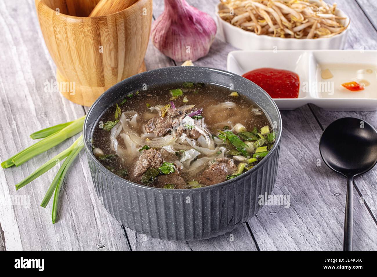 Vietnamese Pho Bo soup with beef and noodles Stock Photo - Alamy