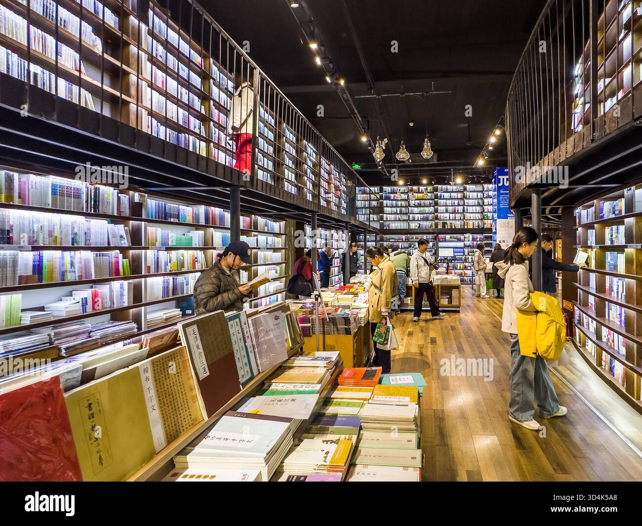 People read books at a bookstore in Beijing, China, 8 November, 2025 ...