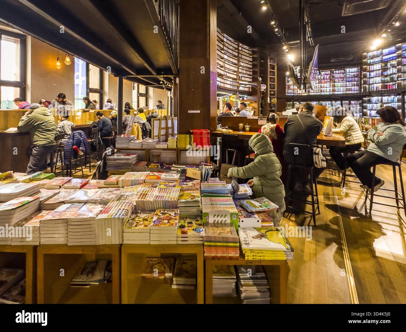 People read books at a bookstore in Beijing, China, 8 November, 2025 ...