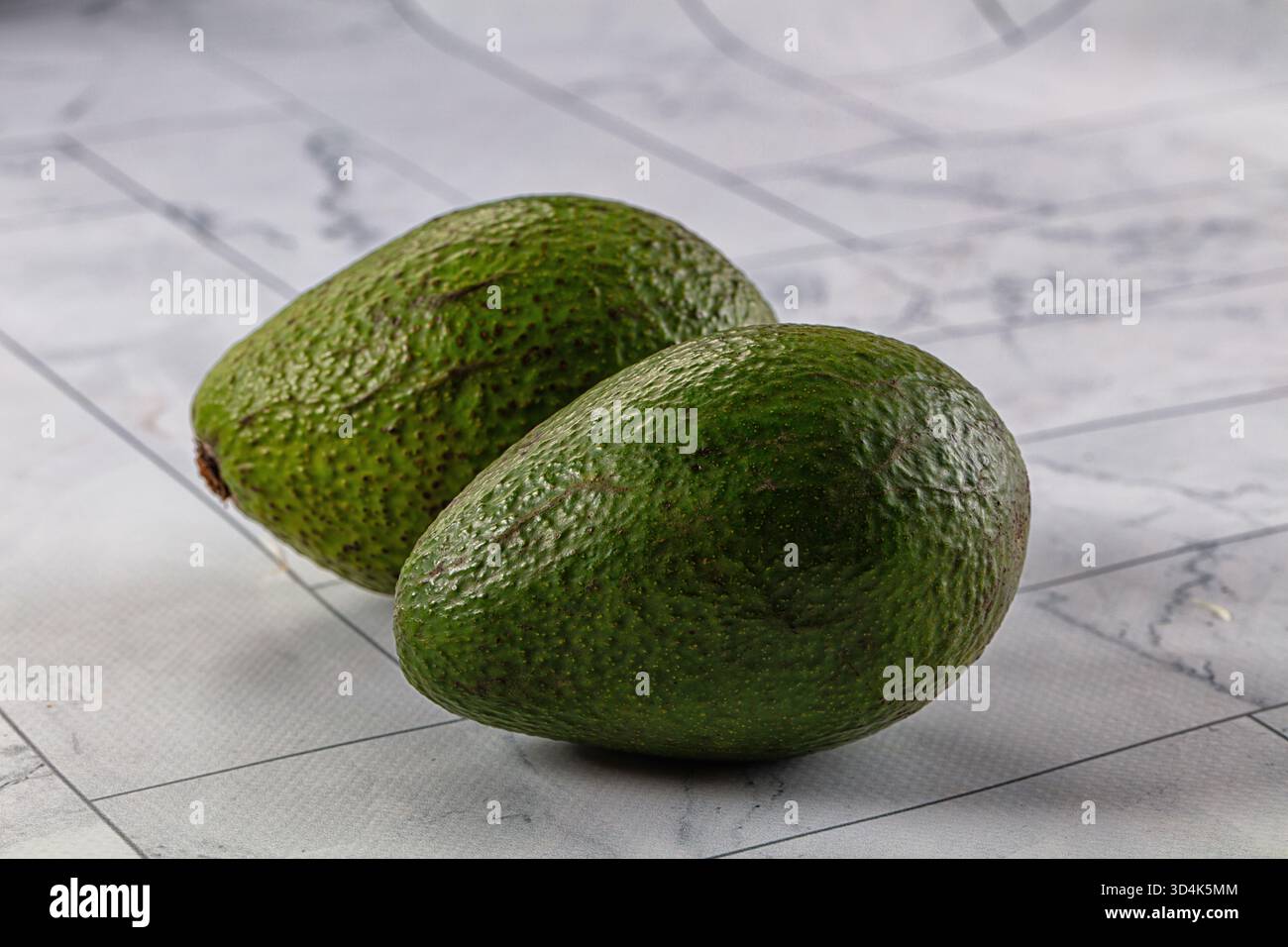 Raw ripe green juicy avocado tropical fruit Stock Photo - Alamy