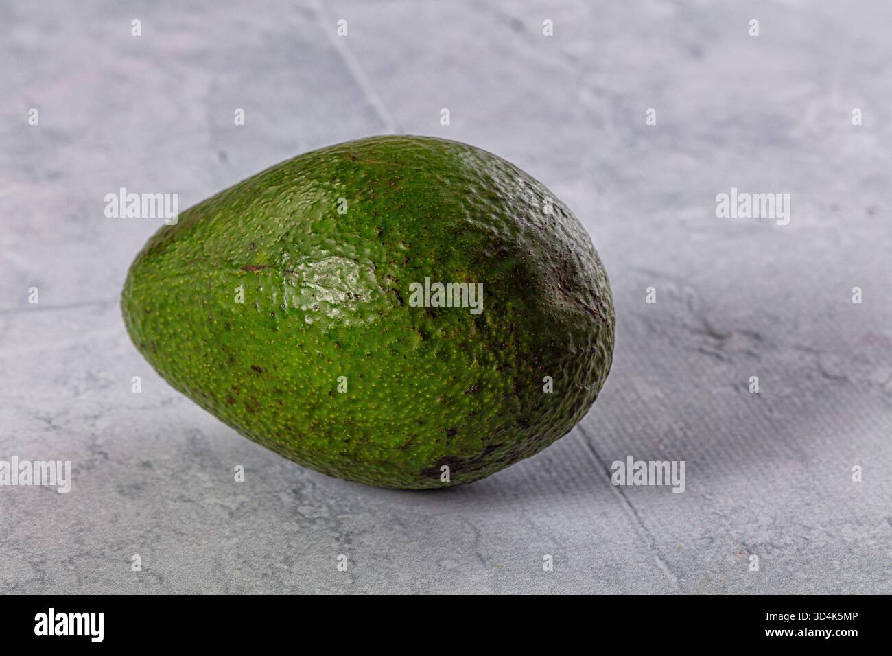 Raw ripe green juicy avocado tropical fruit Stock Photo - Alamy