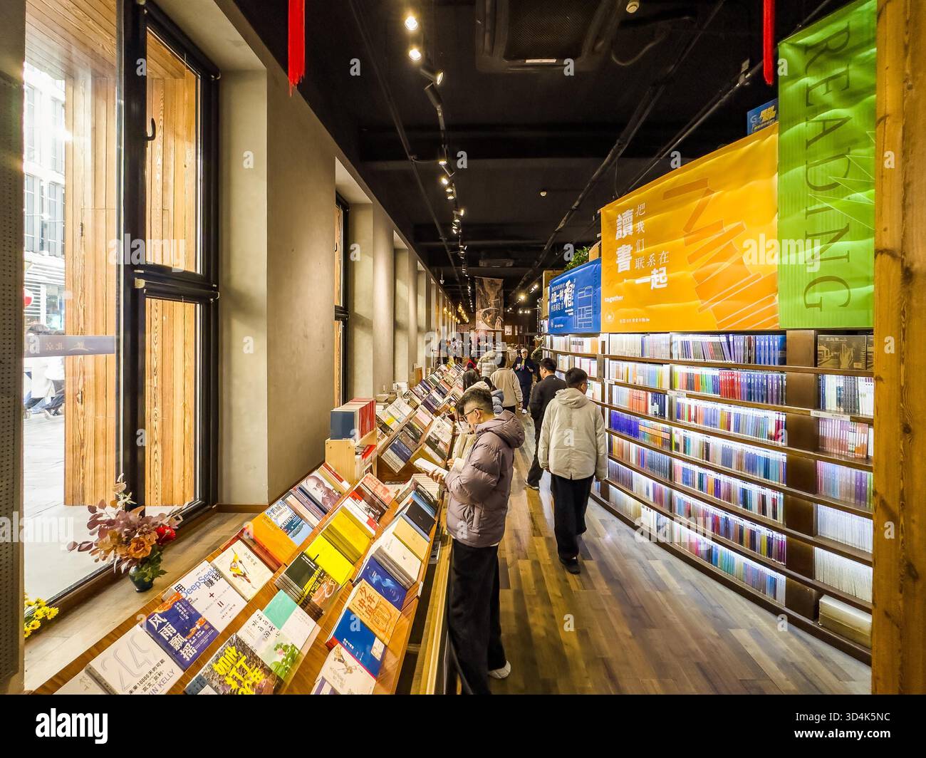 People read books at a bookstore in Beijing, China, 8 November, 2025 ...