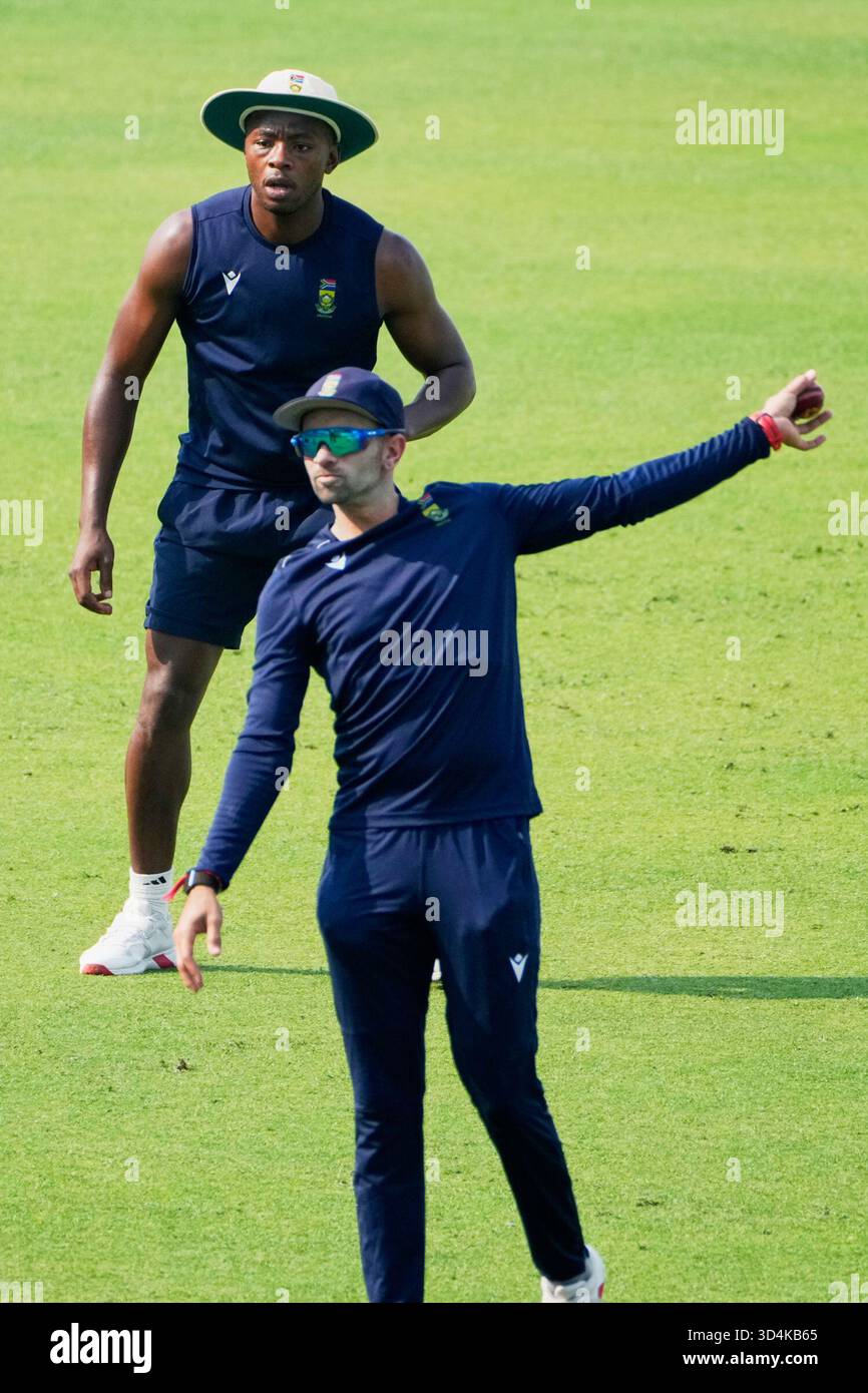 South Africa's Kesav Maharaj, front and Kagiso Rabada during a practice ...
