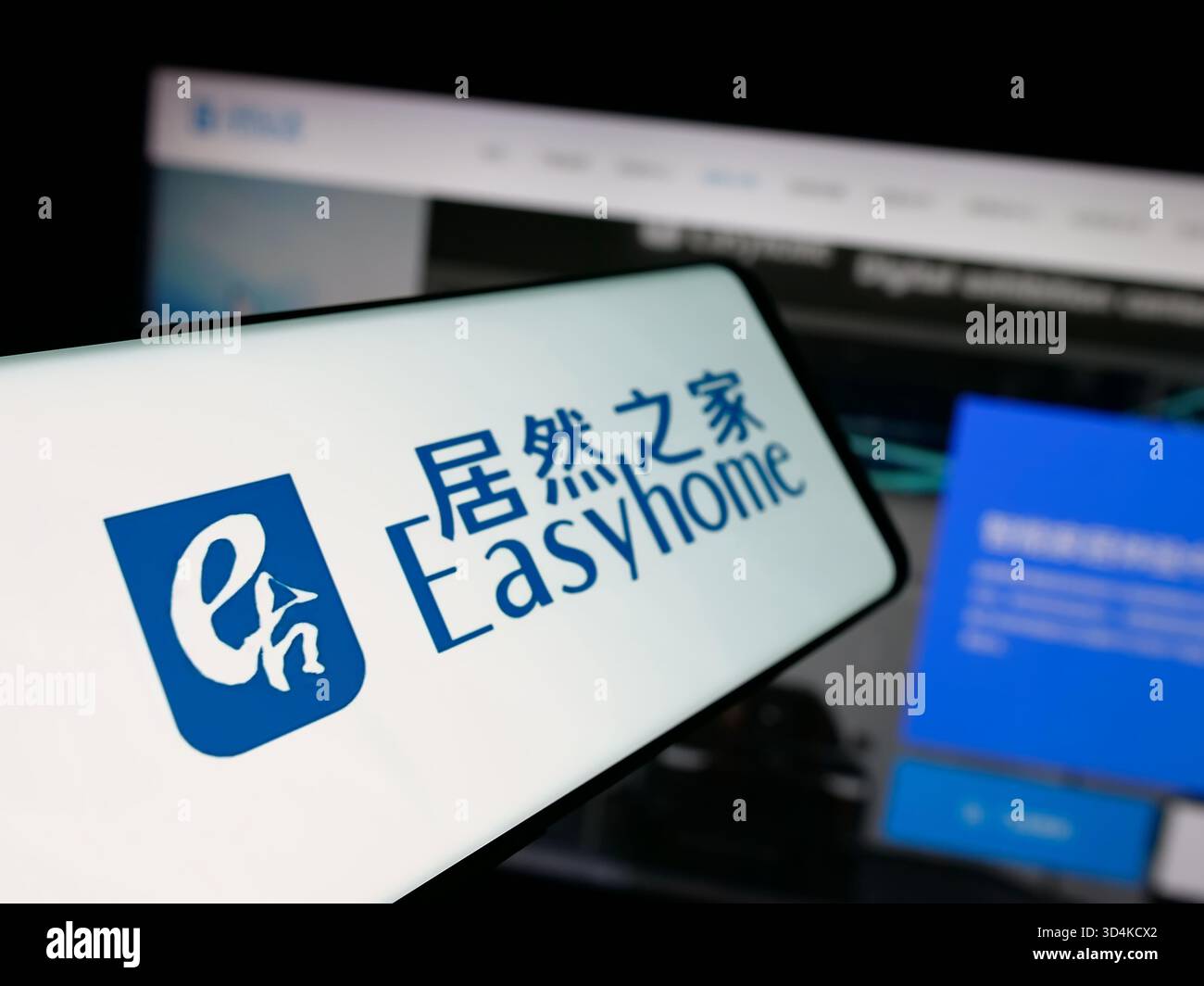 In this photo illustration, a smartphone with the logo of Chinese home furniture company ...