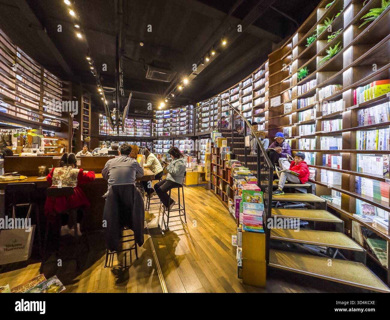 People read books at a bookstore in Beijing, China, 8 November, 2025 ...