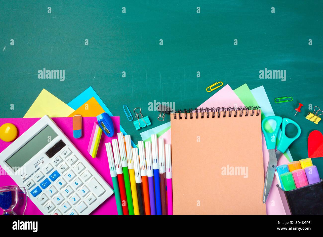 Colorful stationery items arranged on a desk for a school project or ...