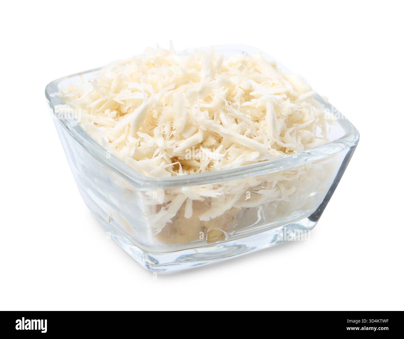 Grated horseradish roots in glass bowl isolated on white Stock Photo ...