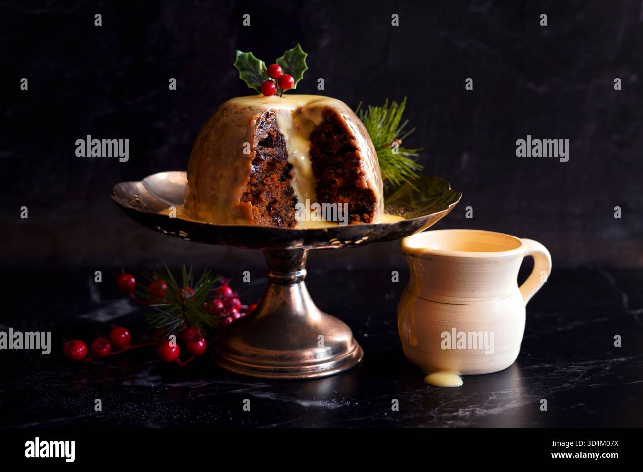 English style festive Christmas plum pudding dessert, served with ...