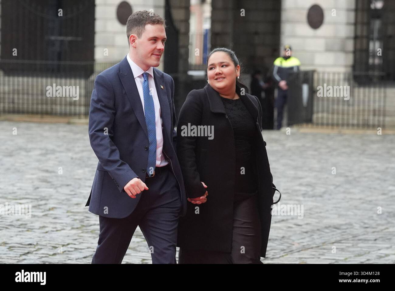 Catherine Connolly's son Brian McEnery and his partner arrive at Dublin ...