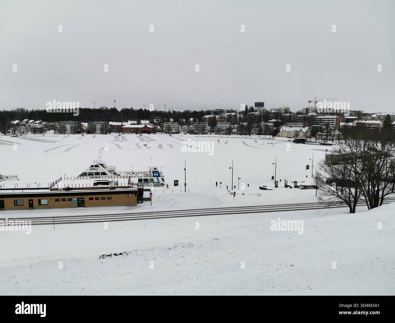 Frozen harbor with snowy landscape during New Year 2026 season Stock ...