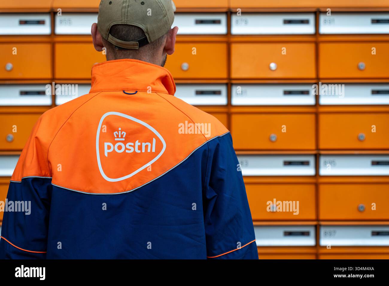 Amsterdam, The Netherlands, 02.06.2025, Postal Employee of PostNL ...
