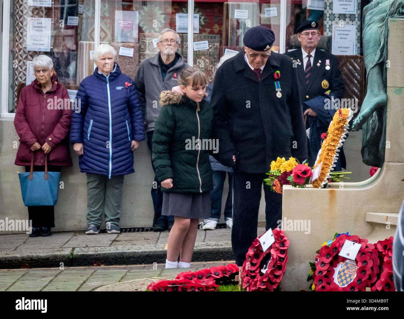 Lewes, East Sussex, UK. 11th November 2025. The people of Lewes gather ...
