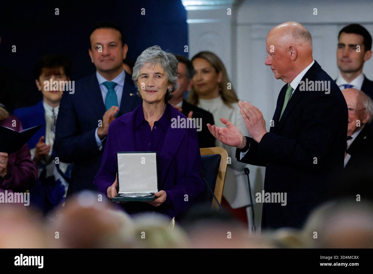Catherine Connolly, with Chief Justice Donal O'Donnell, holds the ...