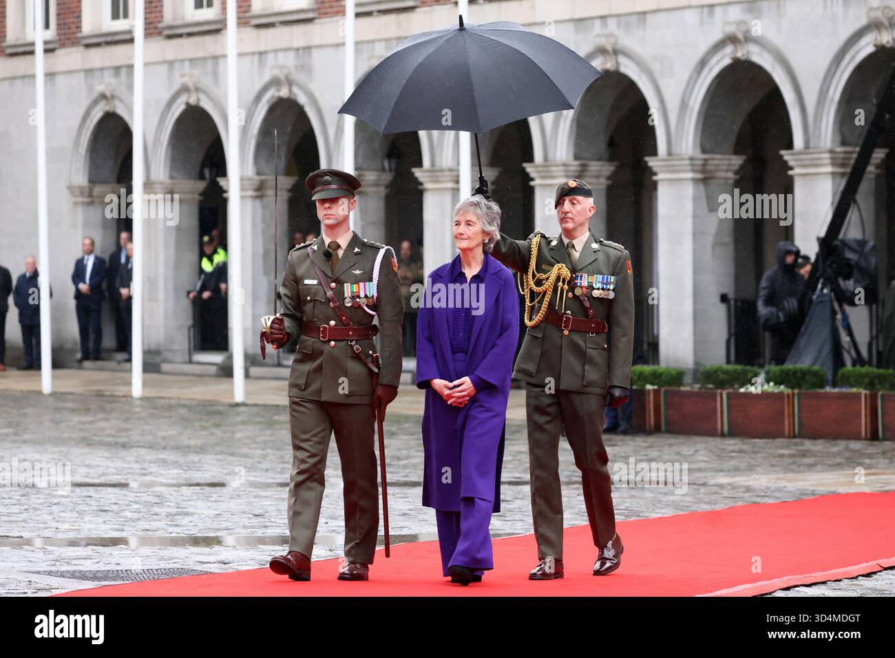 Ireland's new elected President Catherine Connolly reviews the guard of ...