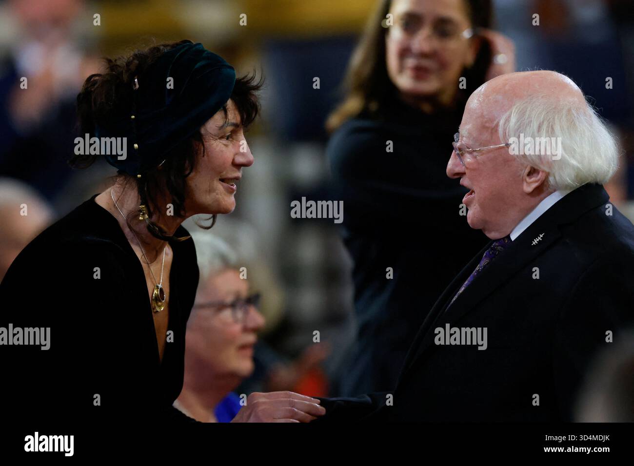 Irish former President Michael D Higgins greets Irish President ...