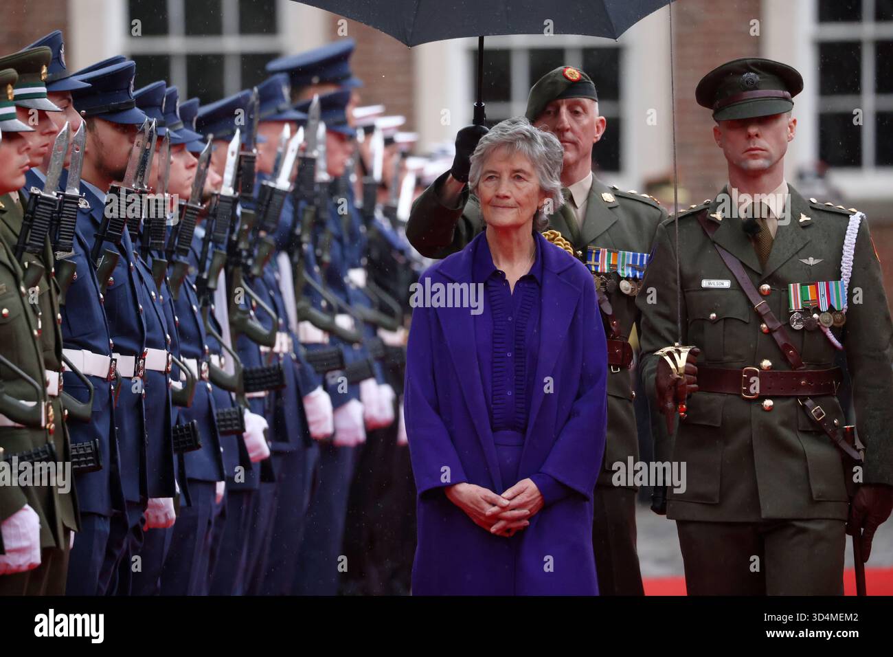 Ireland's new elected President Catherine Connolly reviews the guard of ...