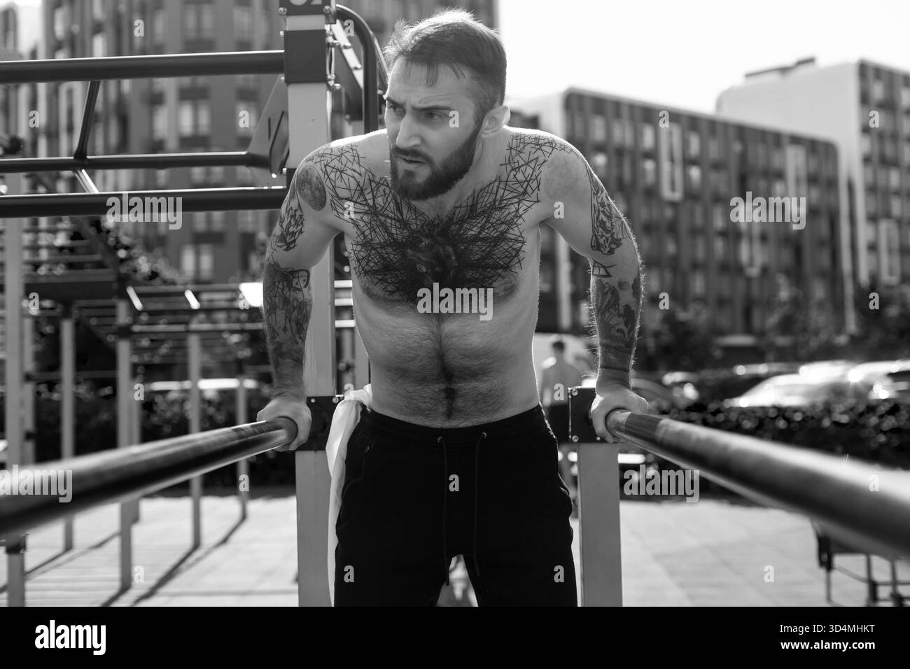Strong young man exercises Black and White Stock Photos & Images - Alamy