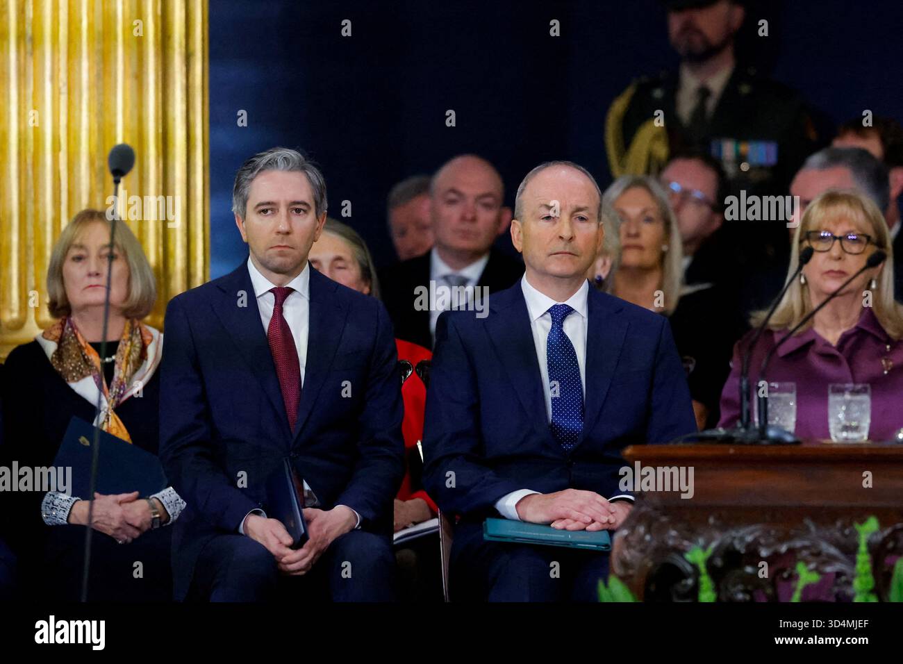 Taoiseach Micheal Martin and Tanaiste Simon Harris during the inauguration ceremony of Catherine ...