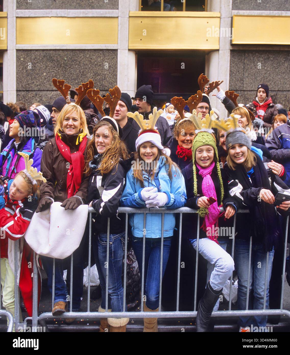 Christmas Holidays. Crowd on street sidewalk watching Thanksgiving Day ...