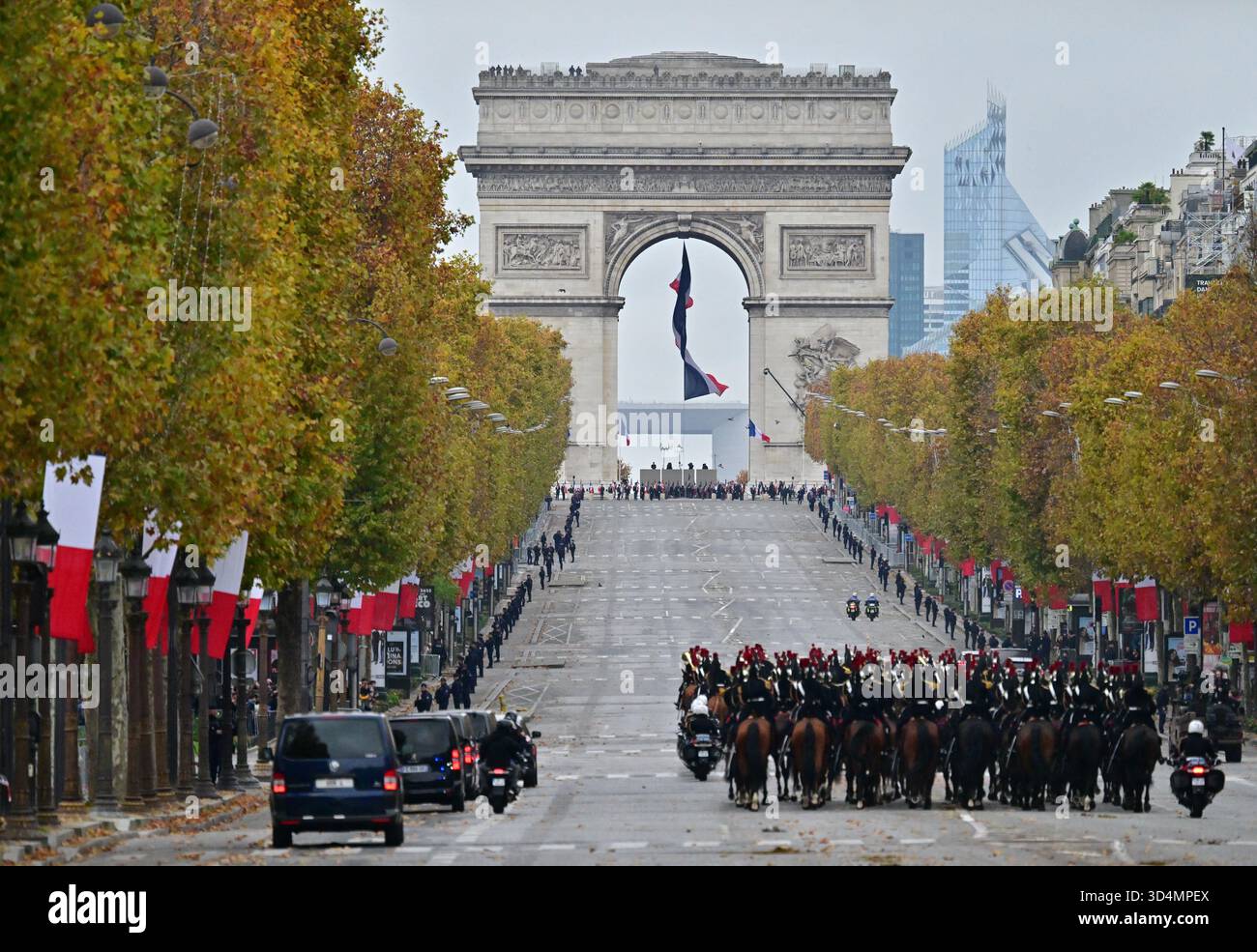 President Emmanuel Macron lays a wreath at statue of Georges Clemenceau ...