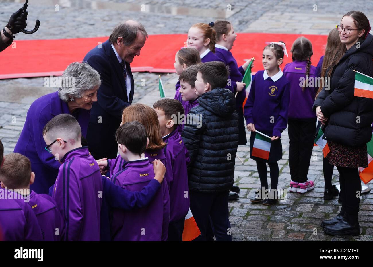 President Catherine Connolly and her husband Brian McEnery speak to ...