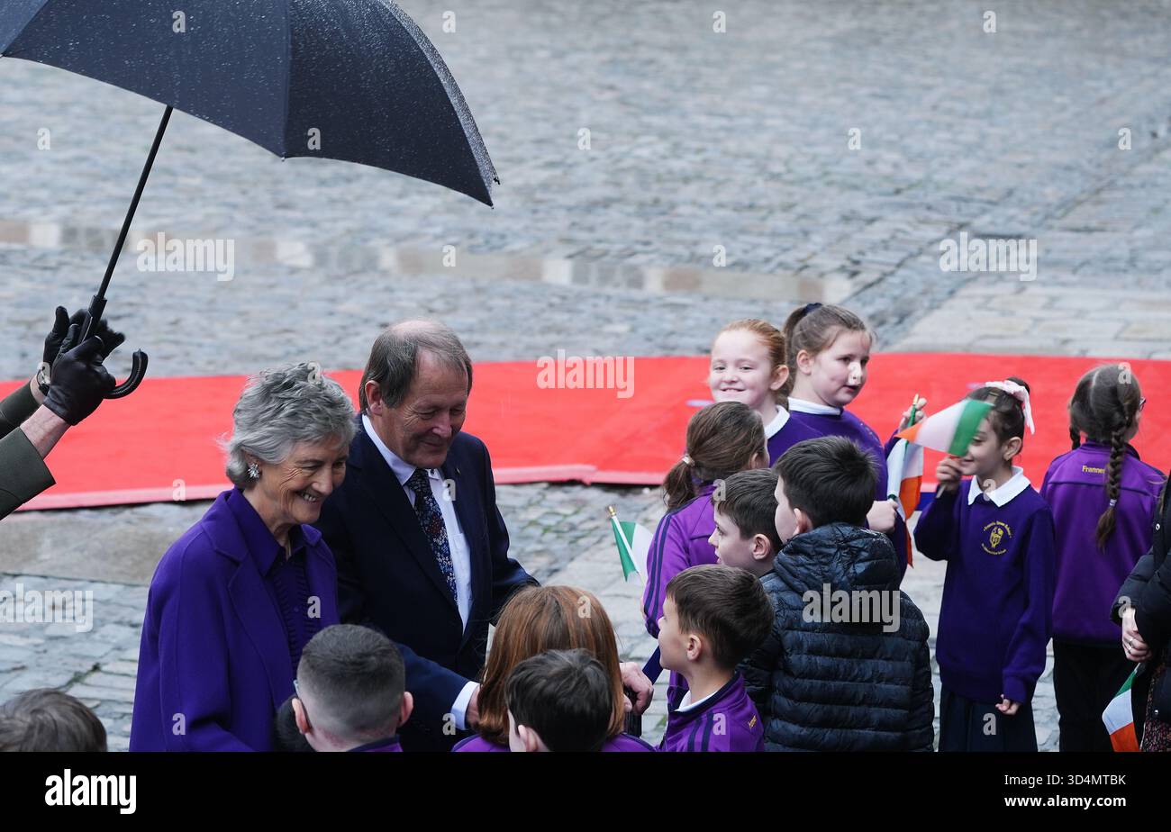 President Catherine Connolly and her husband Brian McEnery speak to ...