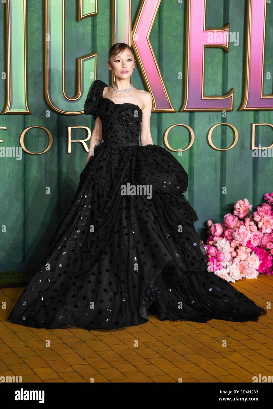 Ariana Grande poses for photographers upon arrival at the premiere of ...
