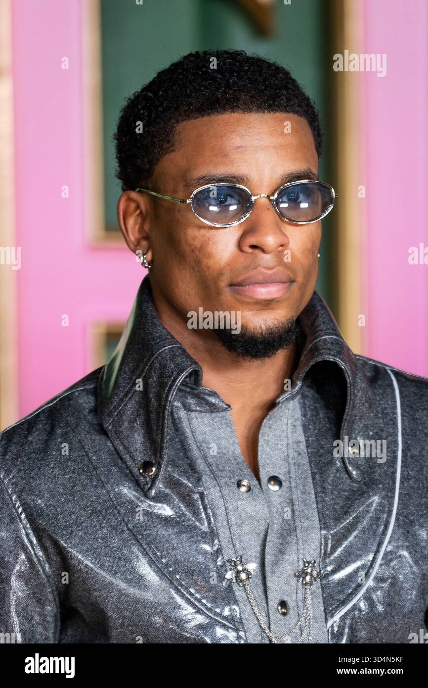 Cacharel Mercer poses for photographers upon arrival at the premiere of ...
