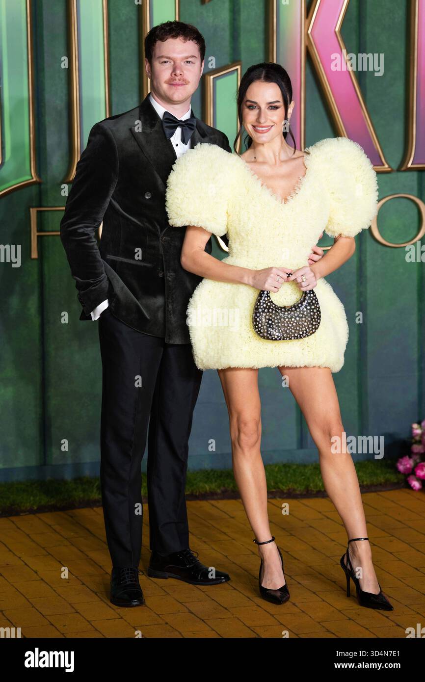 Ben Joyce, left, and Amber Davies pose for photographers upon arrival ...