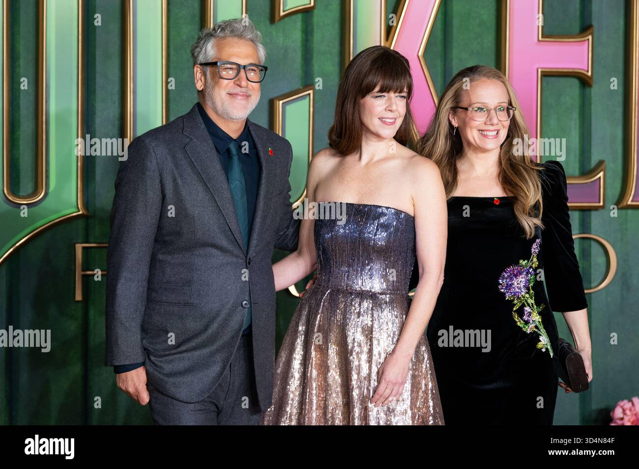 Myron Kerstein, from left, Alice Brooks, Dana Fox pose for ...