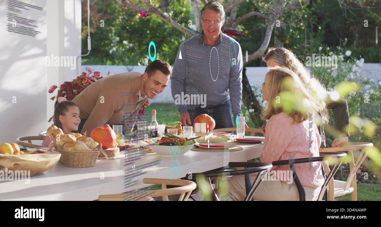 Gathering multigenerational family sharing meal on covered patio, with ...