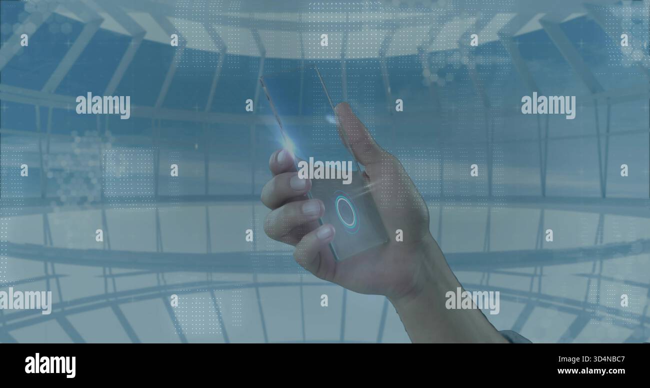 Holding right hand tapping device with glowing UI inside glass dome ...
