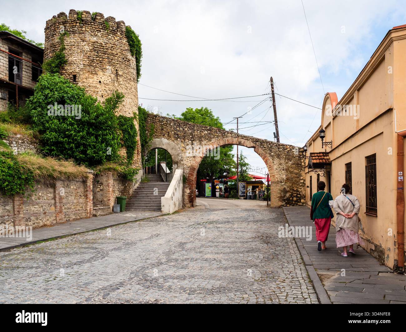 Sighnaghi, Georgia - June 4, 2025: street with ancient city walls in ...
