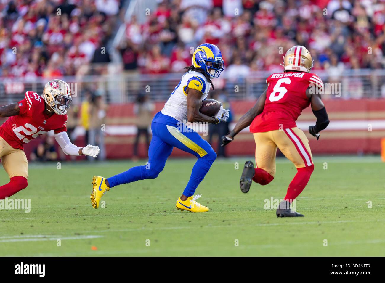 Los Angeles Rams wide receiver Davante Adams (17) catches a pass and ...