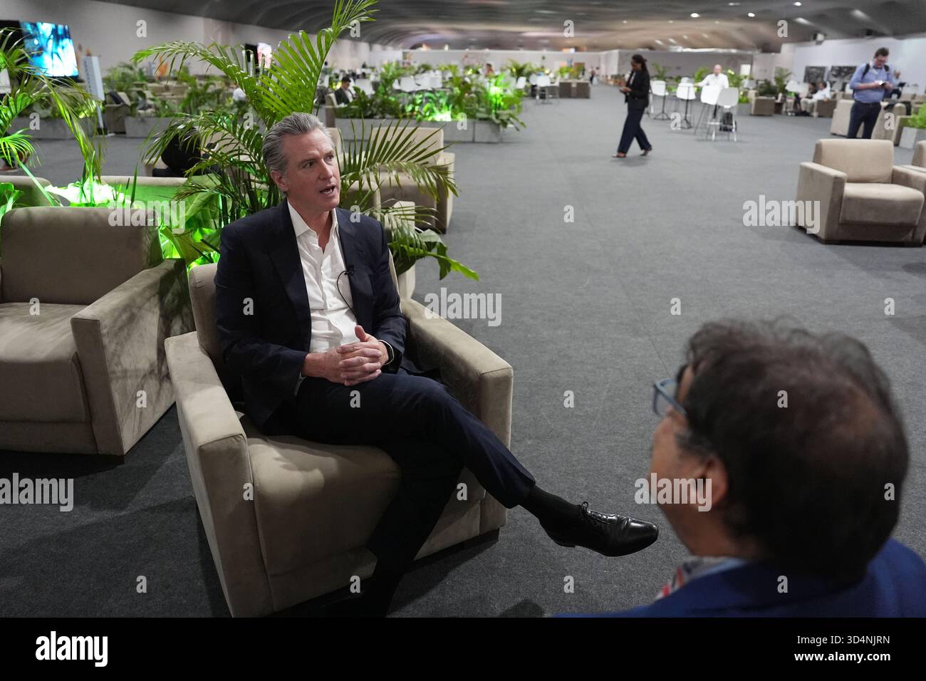 California Gov. Gavin Newsom, left, speaks with Seth Borenstein, of The ...