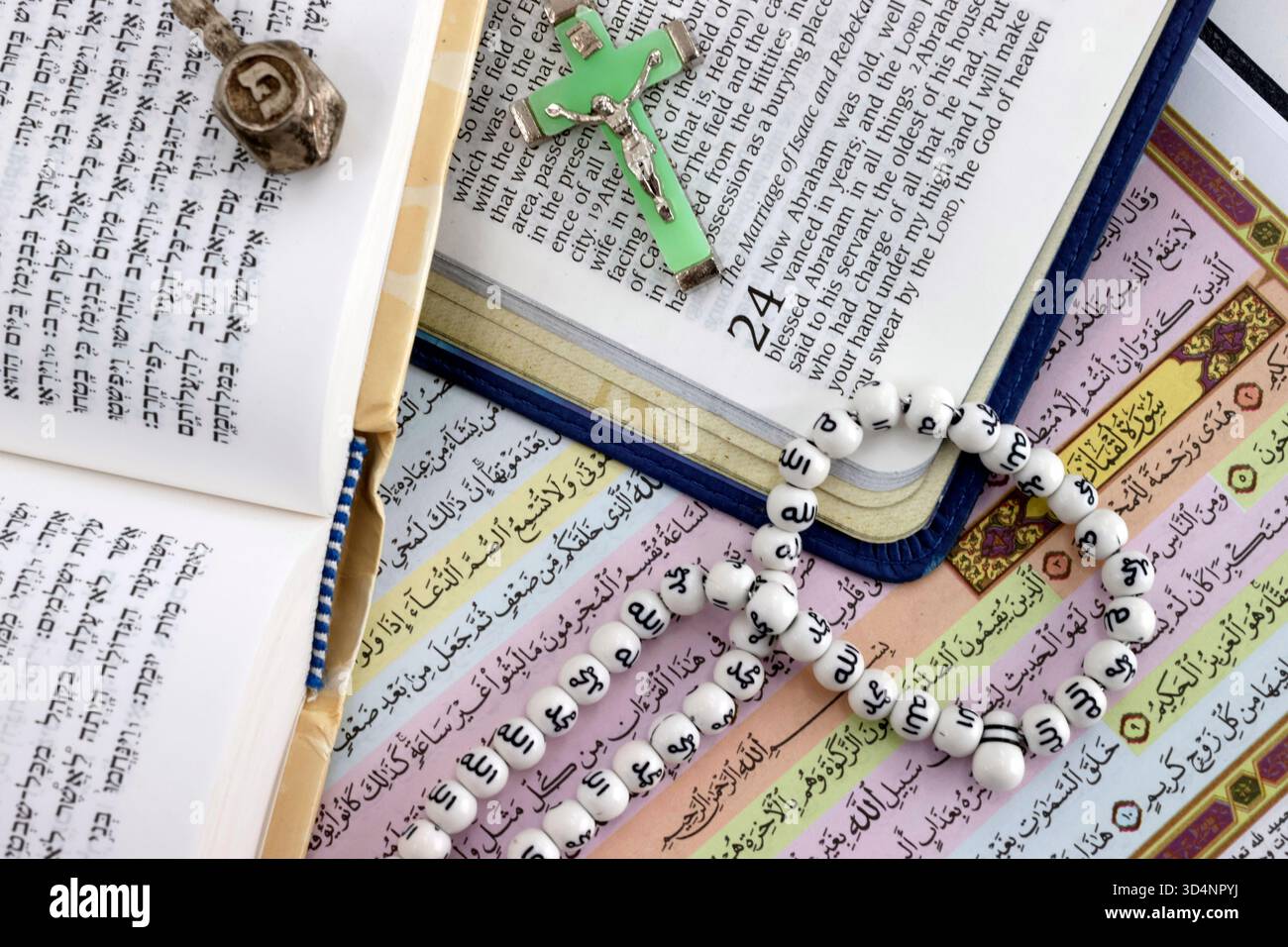 Bible, Quran and Torah with symbols of religions. Concept of interfaith ...