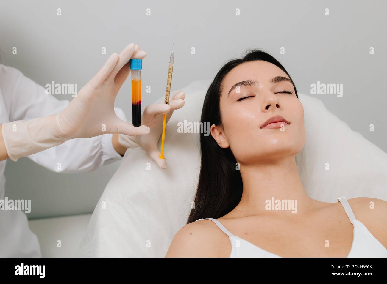 Mesotherapy injection with blood plasma in syringe. Mesotherapy with ...