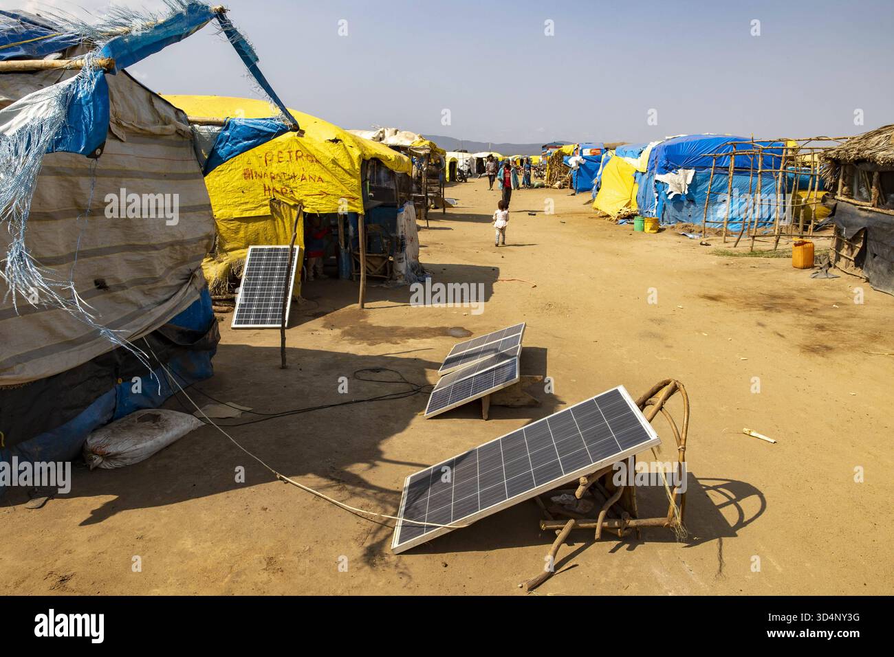 Solar panels in a fishing camp on a bank of Lake Eyasi, Tanzania. Sun ...