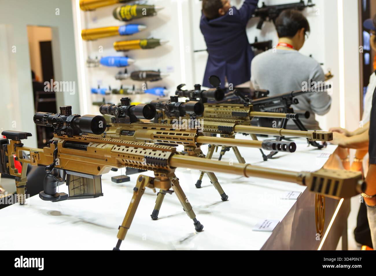 A number of assault rifles gun are displayed during at Defense ...