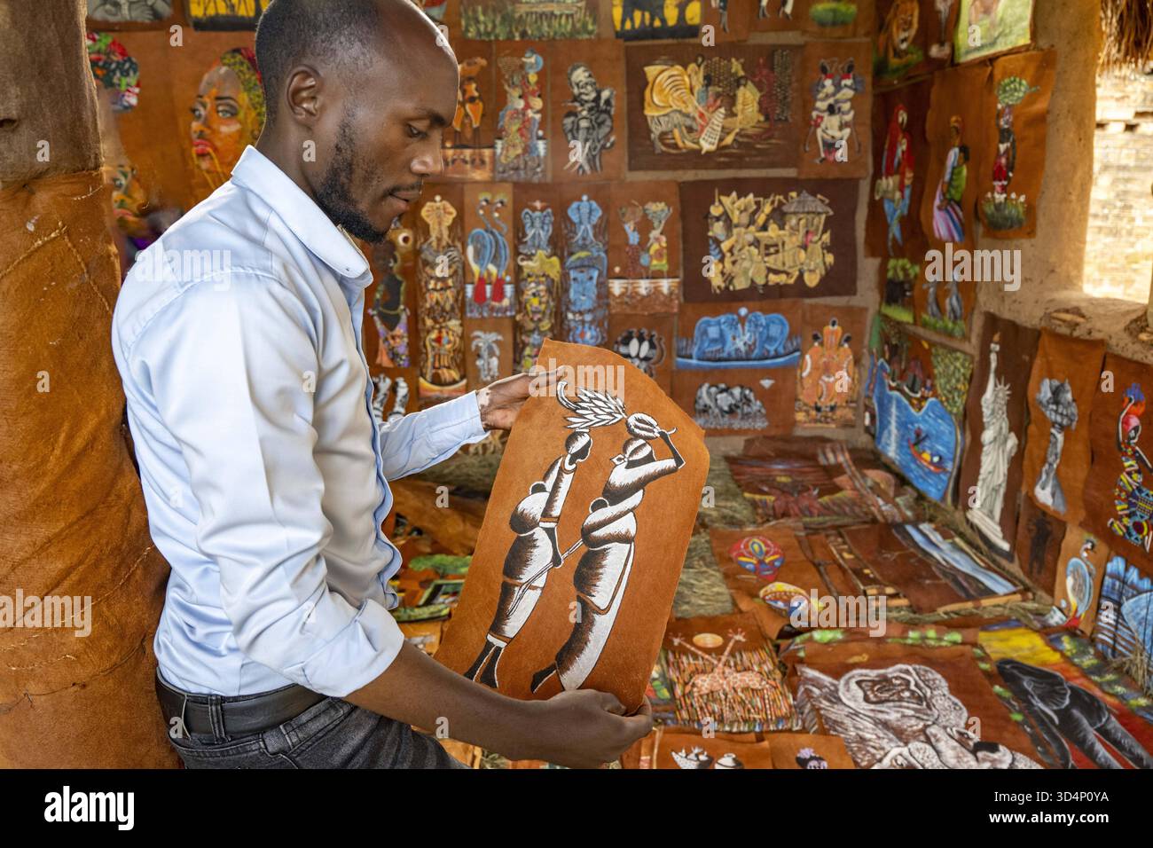 Artist showing his work at Kabaka s palace, Kampala, Uganda. Artist showing his work at Kabaka s ...