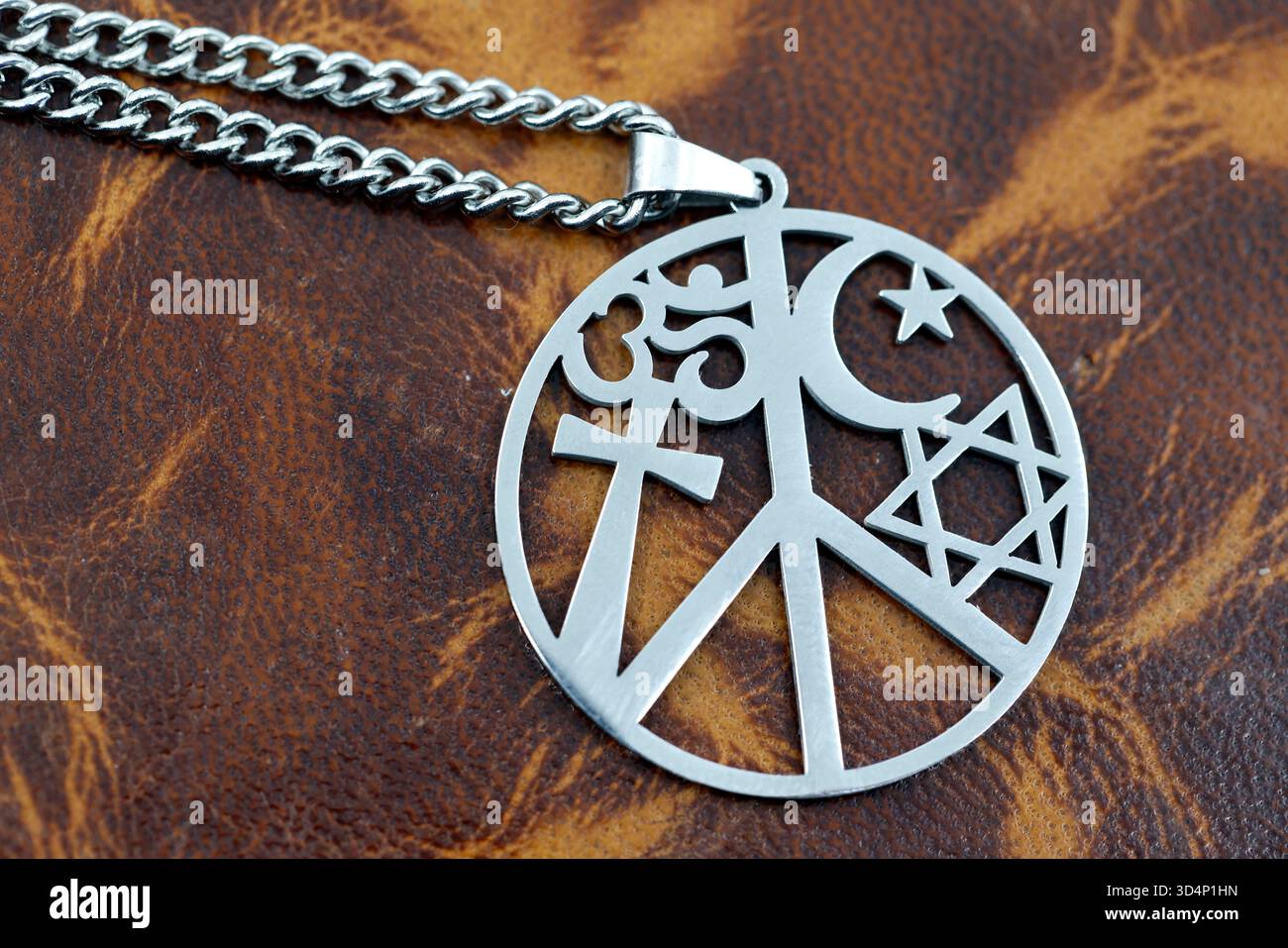 Pendant with symbols of major religions. Christianity, Judaism ...