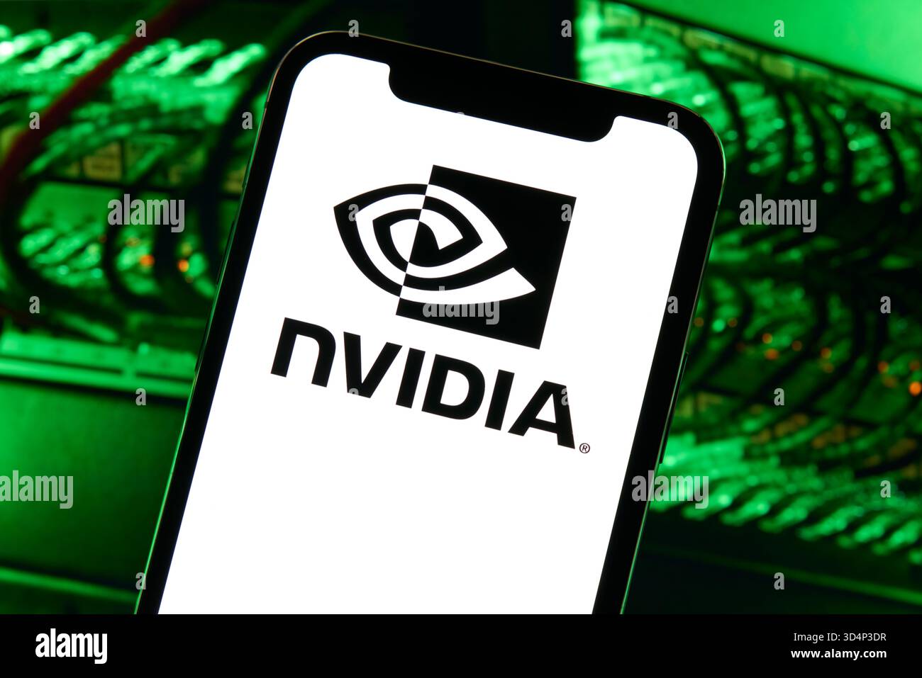 NVIDIA Logo on Smartphone with Server Hardware Background Stock Photo ...