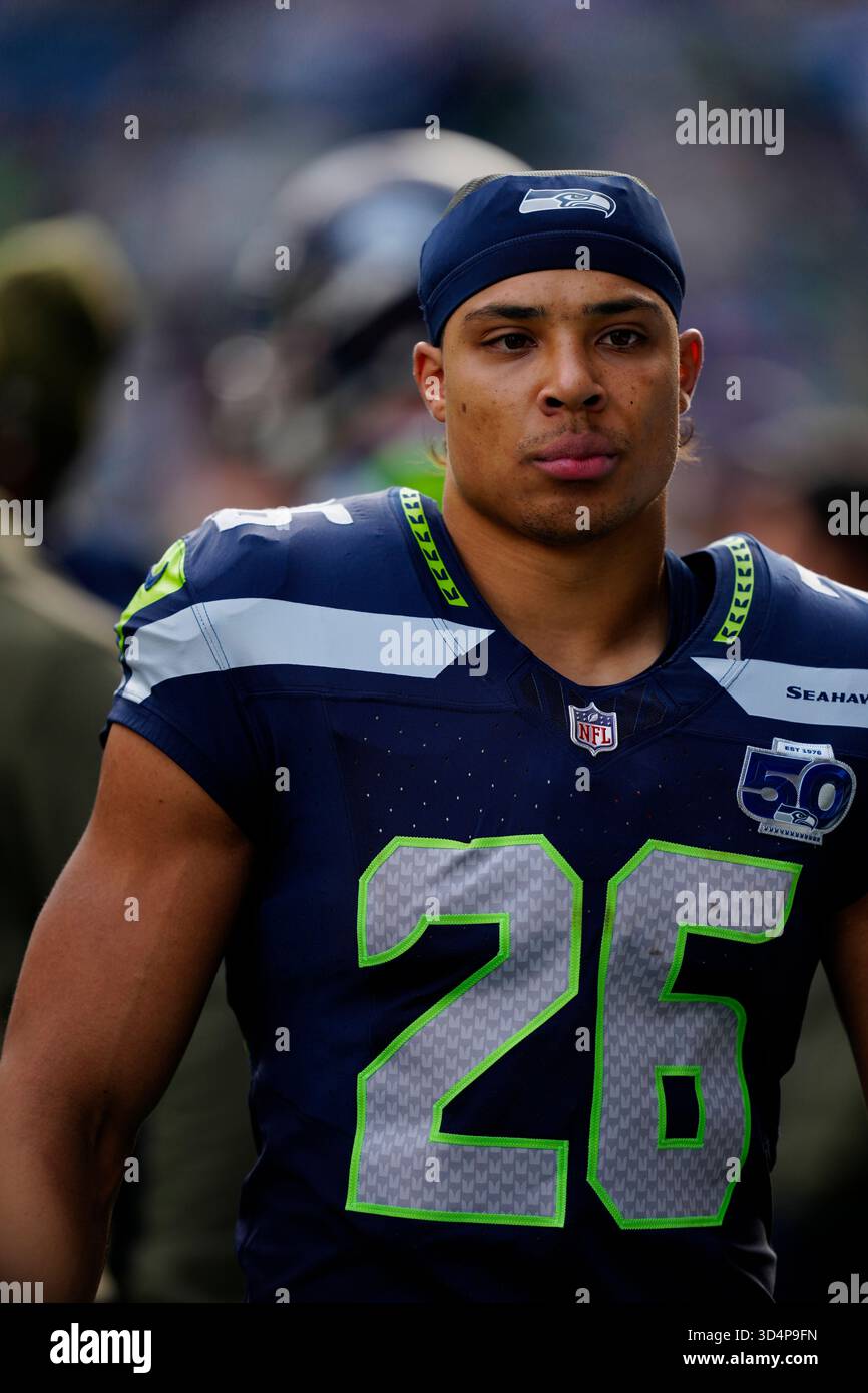 Seattle Seahawks running back Zach Charbonnet (26) looks on before an ...