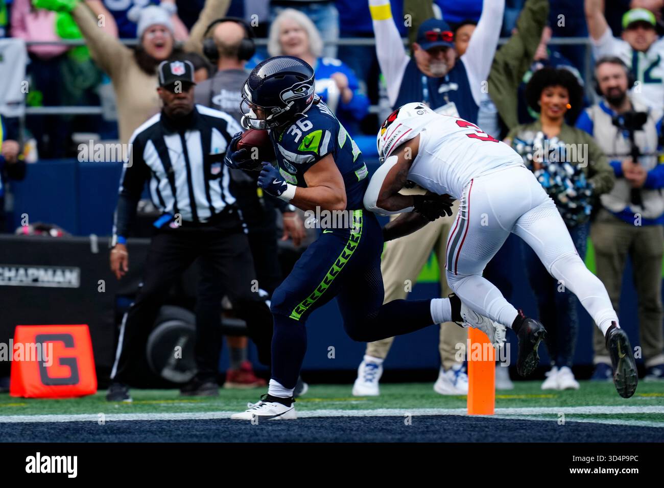 Seattle Seahawks running back George Holani (36) scores a touchdown ...