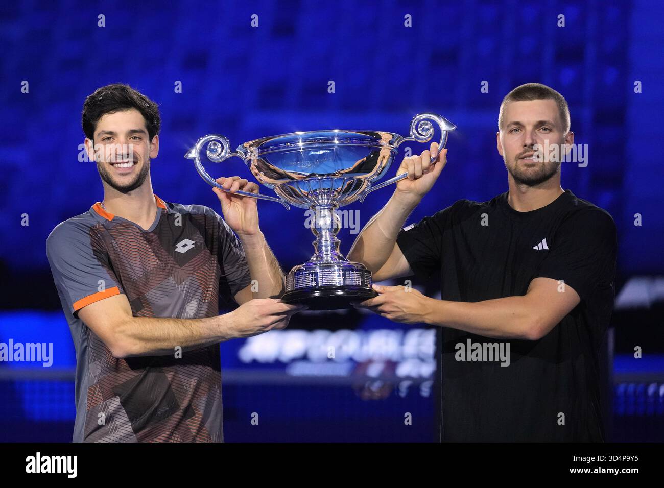 Britain's Julian Cash, left, and Britain's Lloyd Glasspool hold the ...