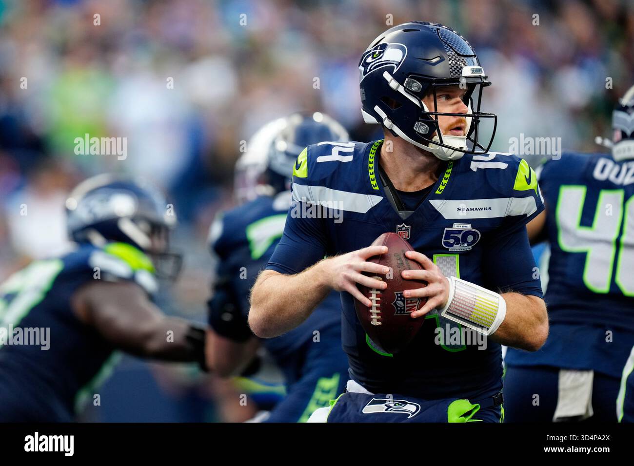 Seattle Seahawks quarterback Sam Darnold (14) looks to pass the ball ...
