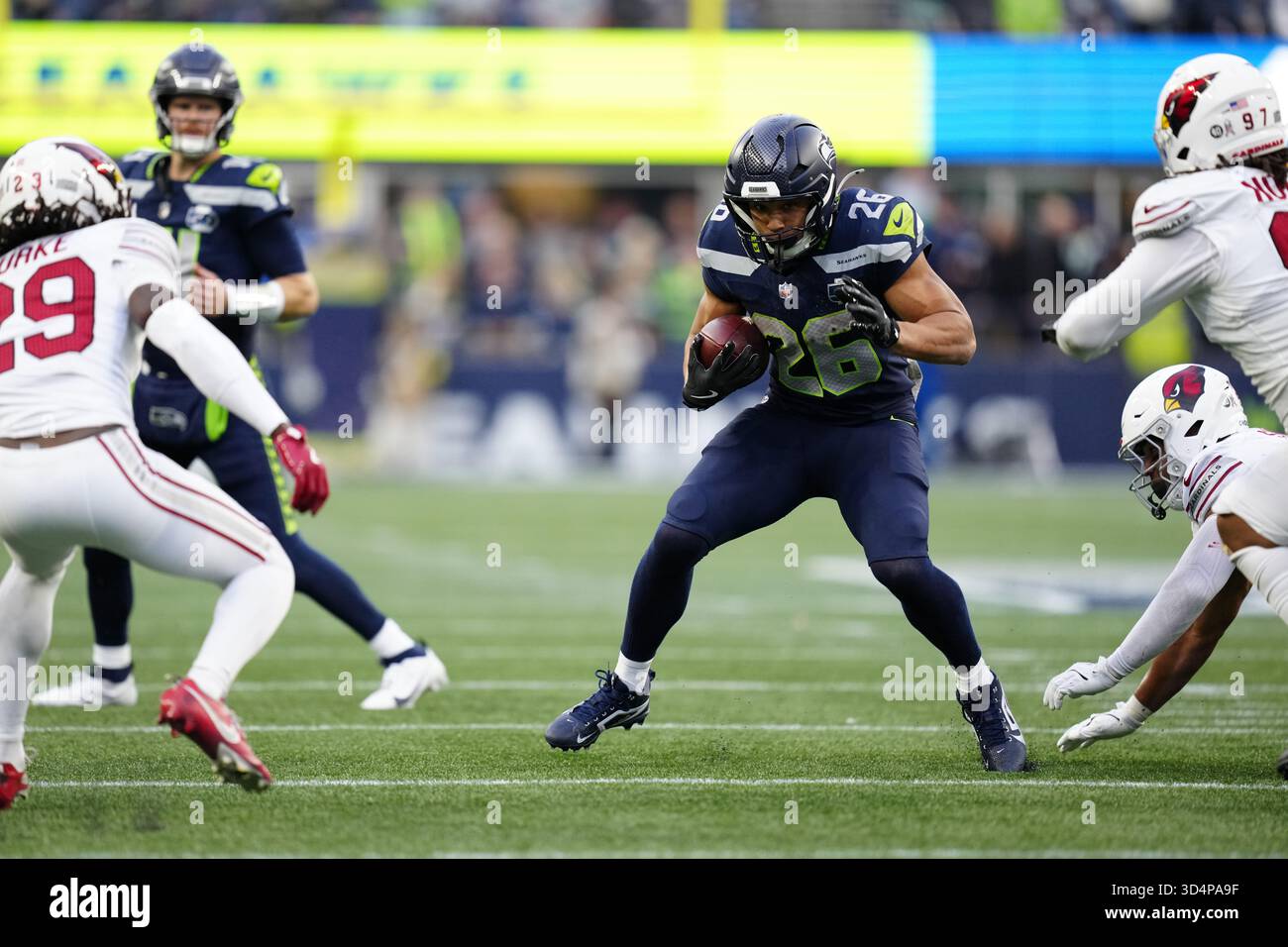Seattle Seahawks running back Zach Charbonnet (26) runs with the ball ...