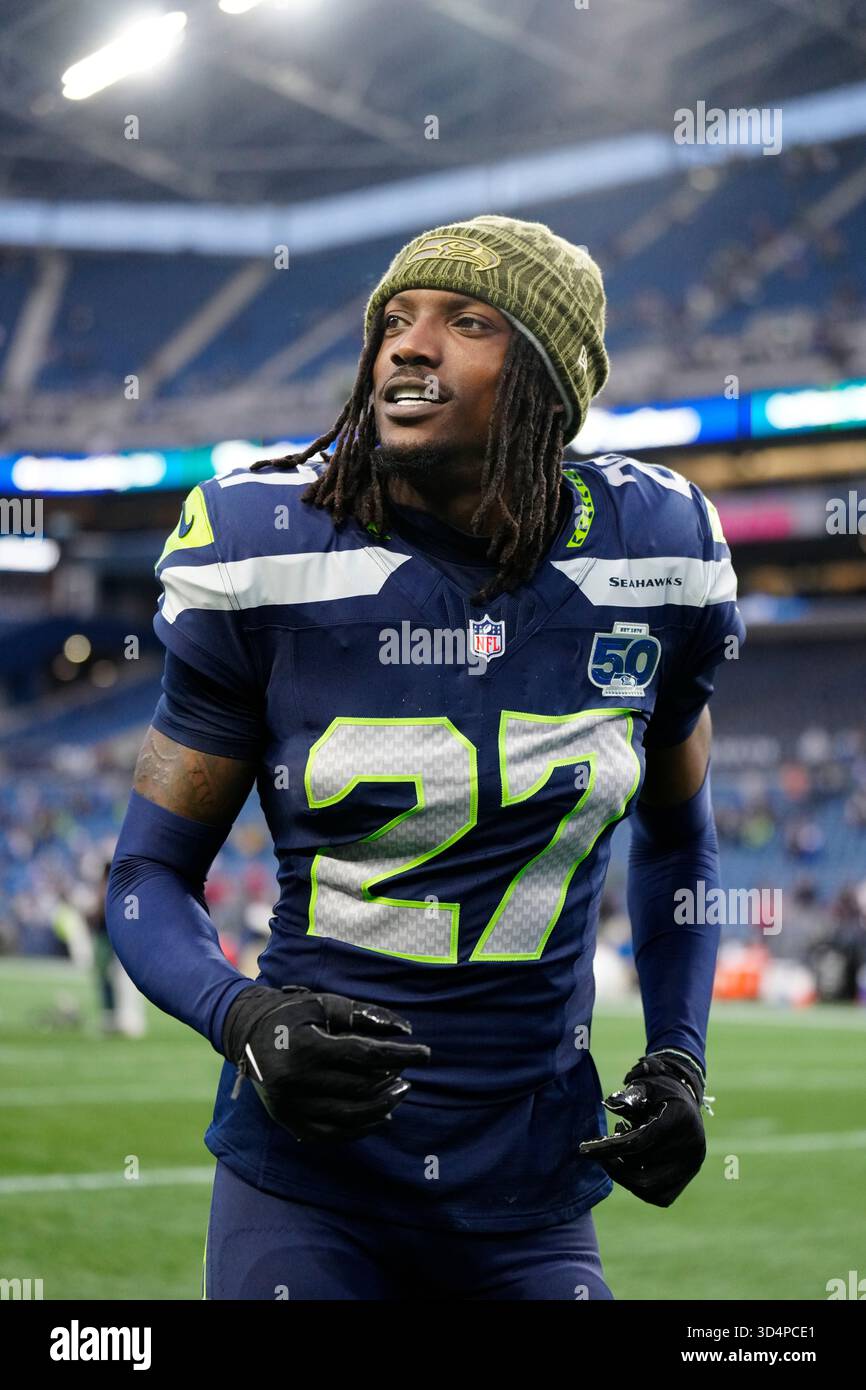 Seattle Seahawks cornerback Riq Woolen (27) walks off the field after ...
