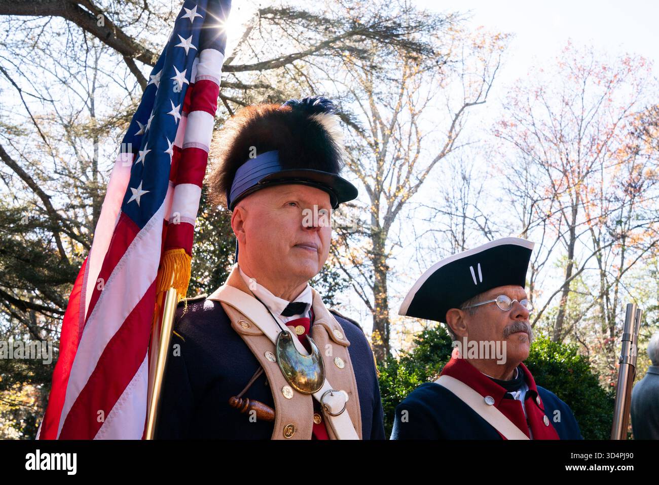 Members of the color guard arrive before the Veterans Day wreath laying ...